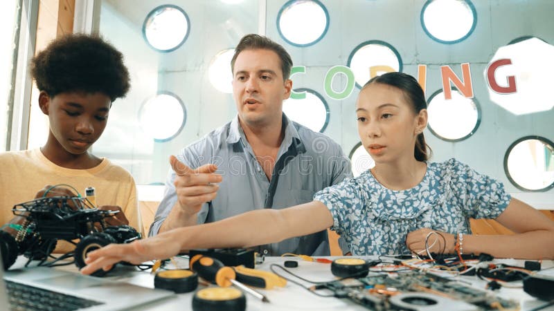Student Asking Teacher about Code and Pointing at Laptop Screen ...