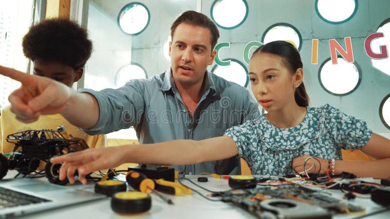 Student Asking Teacher about Code and Pointing at Laptop Screen ...