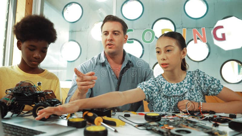 Student Asking Teacher about Code and Pointing at Laptop Screen ...