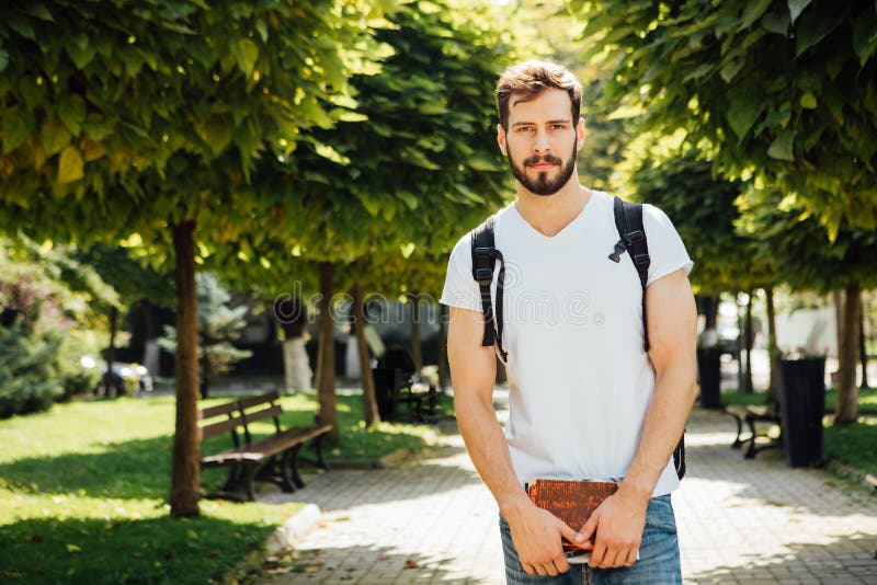Student with Backpack Outside Stock Image - Image of white, outdoor ...
