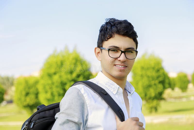 Student with Backpack Outside School. Stock Photo - Image of male ...
