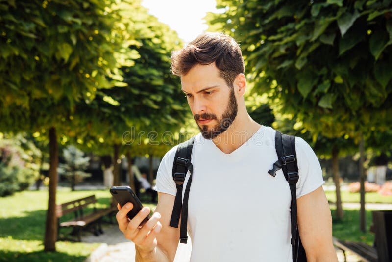 Student with Backpack Talking at Cellphone Stock Photo - Image of happy ...
