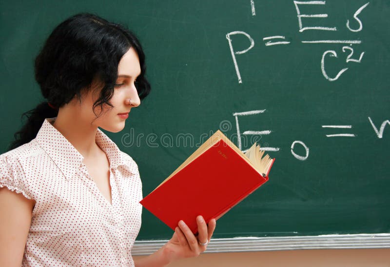 Student at the blackboard stock image. Image of chalkboard - 11007937