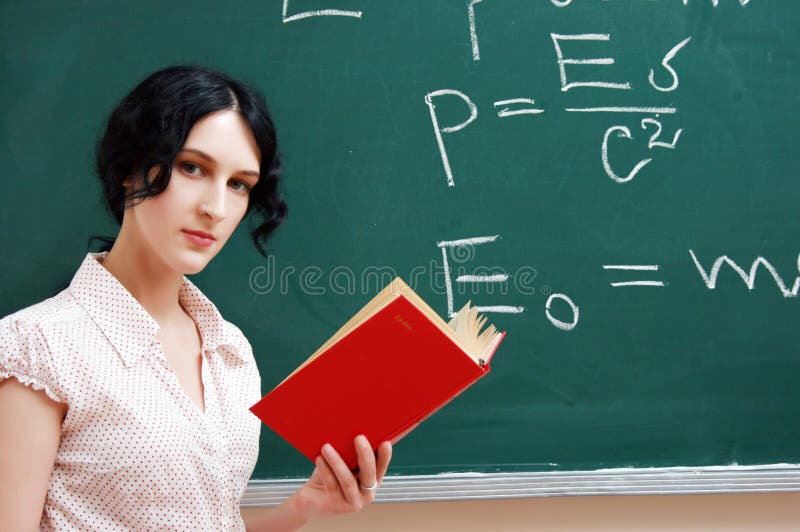 Student at the blackboard stock photo. Image of chalk - 11007956