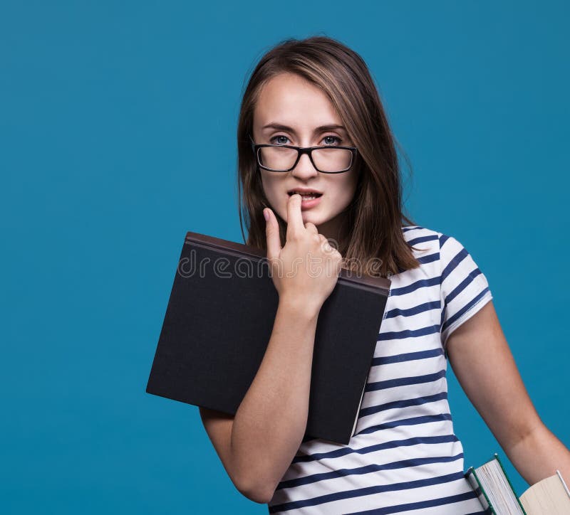 Student with books stock image. Image of education, hand - 143265367