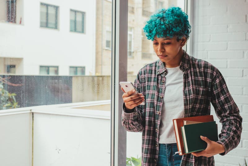 Student with Books and Mobile Phone Stock Photo - Image of hair, learn ...
