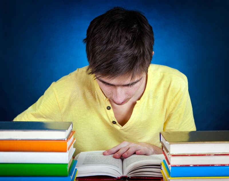 Student with a Books stock image. Image of serious, pupil - 81838079