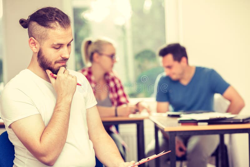 Student Boy in Front of Her Mates in Classroom Stock Photo - Image of ...