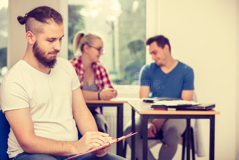 Student Boy in Front of Her Mates in Classroom Stock Image - Image of ...