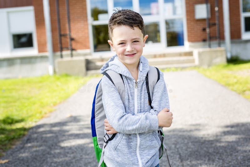 Student Outside School Standing Smiling Stock Photo - Image of class ...