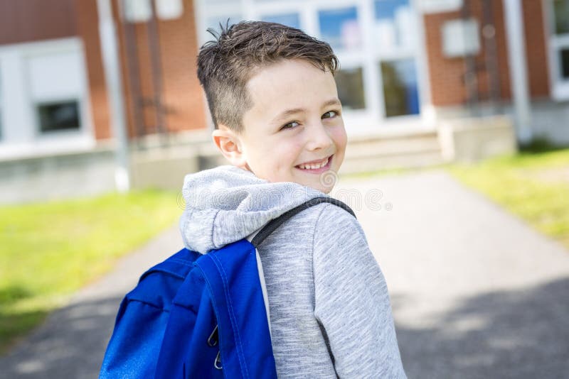 Student Outside School Standing Smiling Stock Photo - Image of smile ...