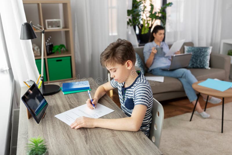 Student Boy with Tablet Computer Learning at Home Stock Photo - Image ...