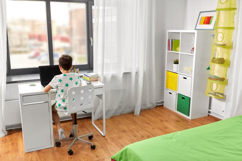 Student Boy Typing on Laptop Computer at Home Stock Photo - Image of ...