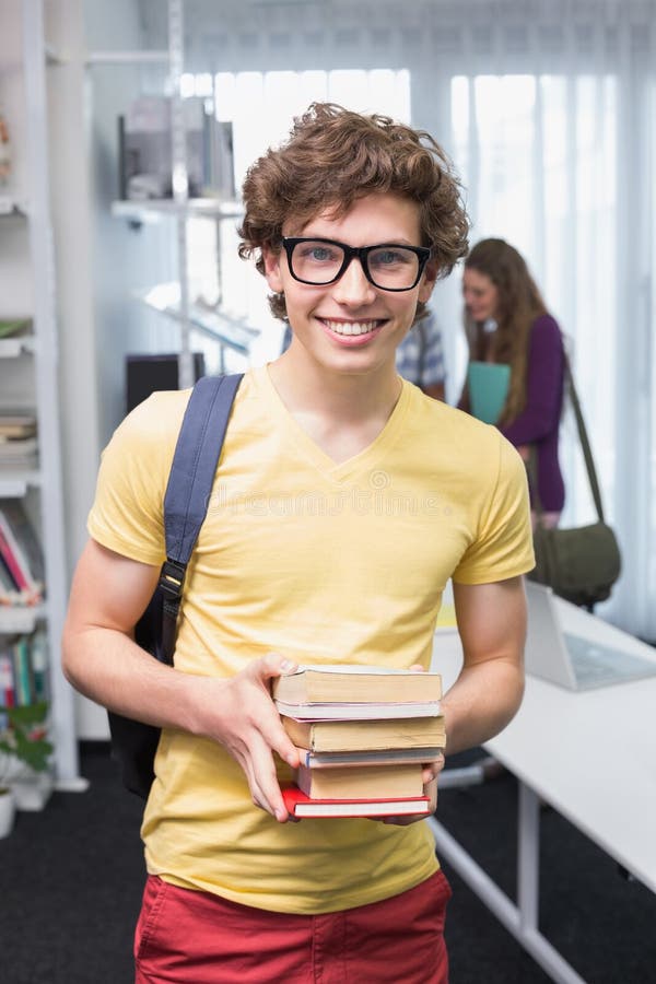 Student Carrying Small Pile of Books Stock Image - Image of education ...