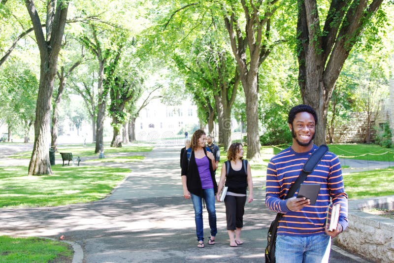 Student checking tablet stock photo. Image of friendship - 48645672