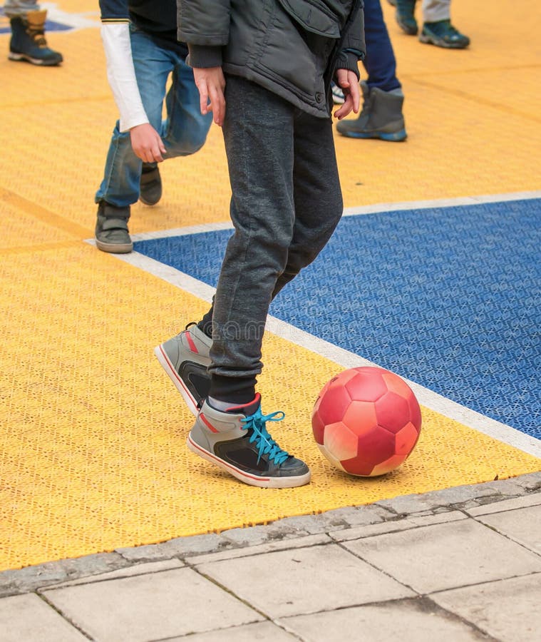 Student Children Play Football with Ball in the School Yard Stock Photo ...
