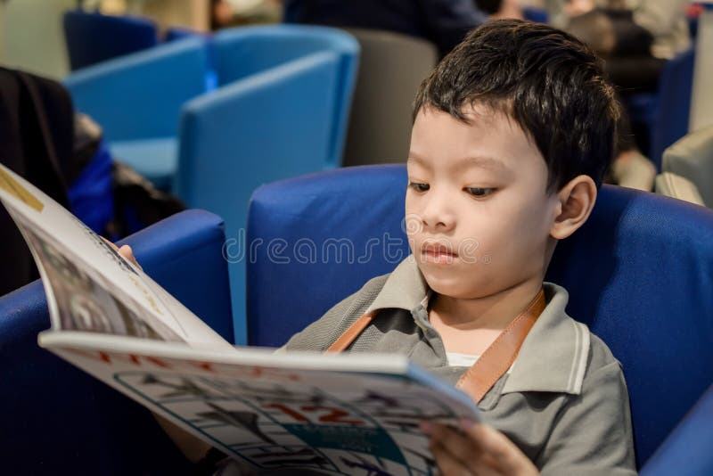 Student in Class Reading Book Stock Image - Image of concentration ...