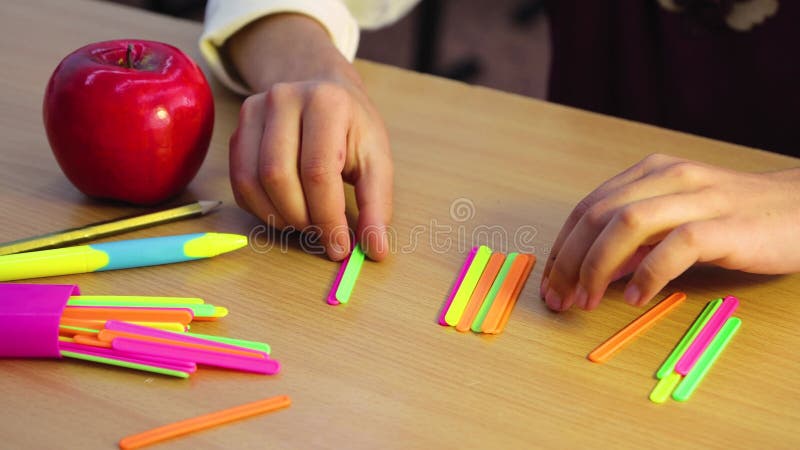 A Student in the Classroom or at Home Learns Math with Counting Sticks ...