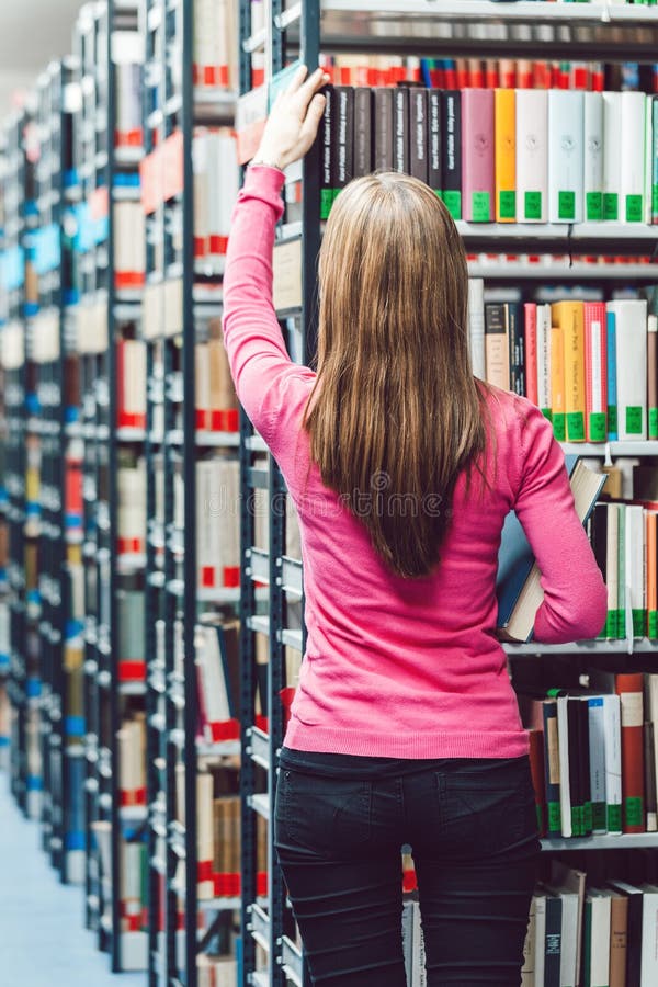 Student in College Library Reading a Book Stock Photo - Image of campus ...