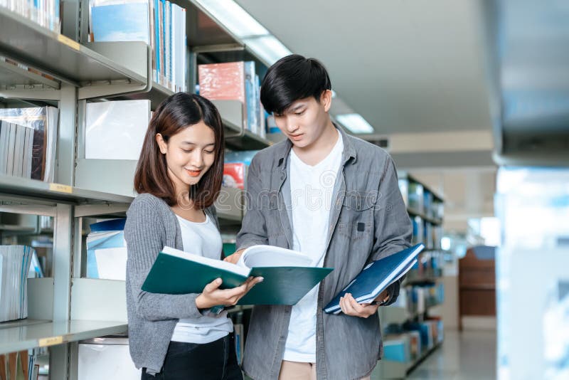 Student College Opening and Reading a Book at Library Stock Image ...