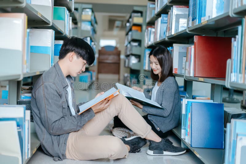 Student College Opening and Reading a Book at Library Stock Image ...