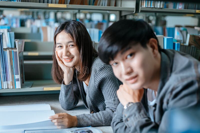 Student College Opening and Reading a Book at Library Stock Image ...