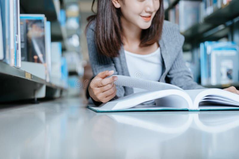 Student College Opening and Reading a Book at Library Stock Image ...