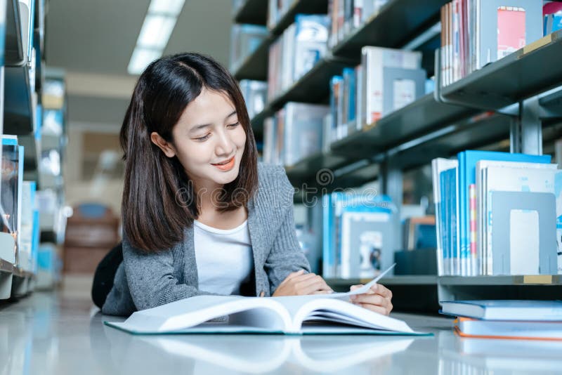 Student College Opening and Reading a Book at Library Stock Image ...