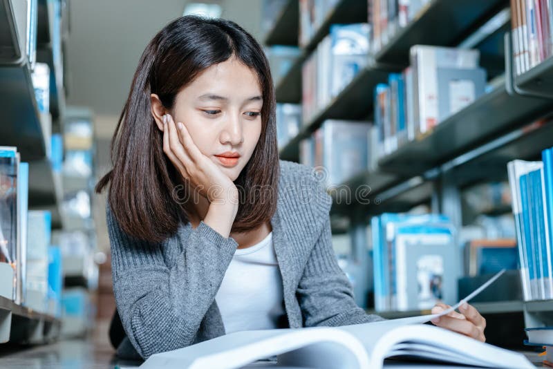 Student College Opening and Reading a Book at Library Stock Image ...