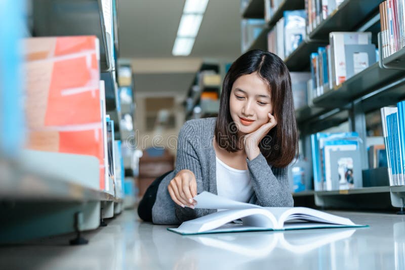 Student College Opening and Reading a Book at Library Stock Image ...
