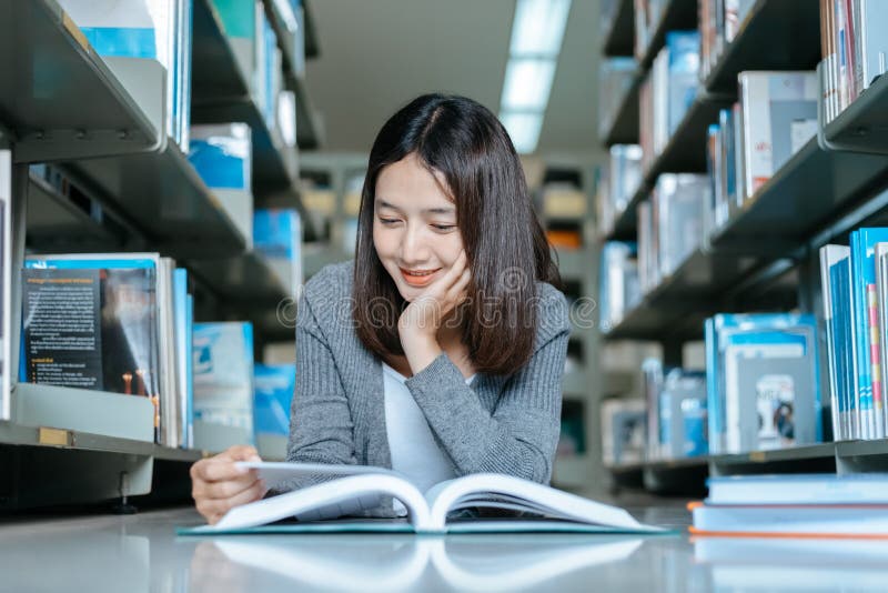 Student College Opening and Reading a Book at Library Stock Image ...