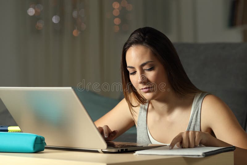 Student Comparing Notes Online in the Night Stock Image - Image of ...