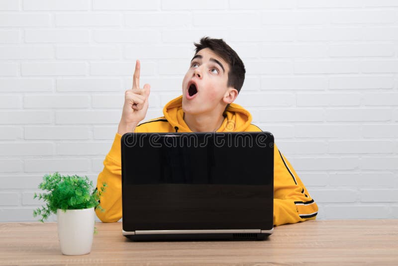 Student with Computer Pointing Finger Stock Photo - Image of modern ...