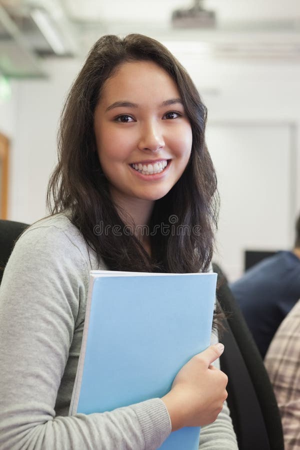 Student in a Computer Room Holding a Folder Stock Photo - Image of ...
