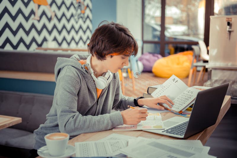 Student Concentratedly Writing His Own Research Project Stock Image ...