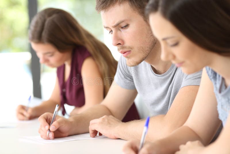 Student Copying an Exam of a Classmate Stock Image - Image of graduate ...