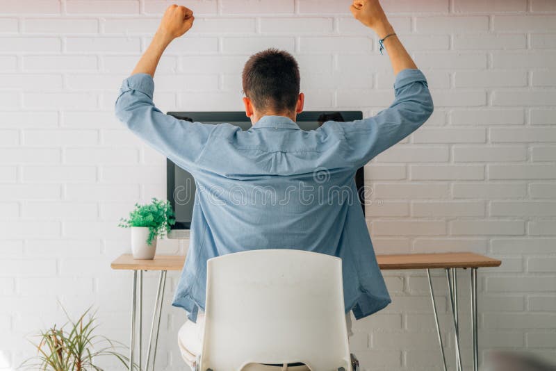 Student at the Desk with Computer and Expression of Success Stock Photo ...