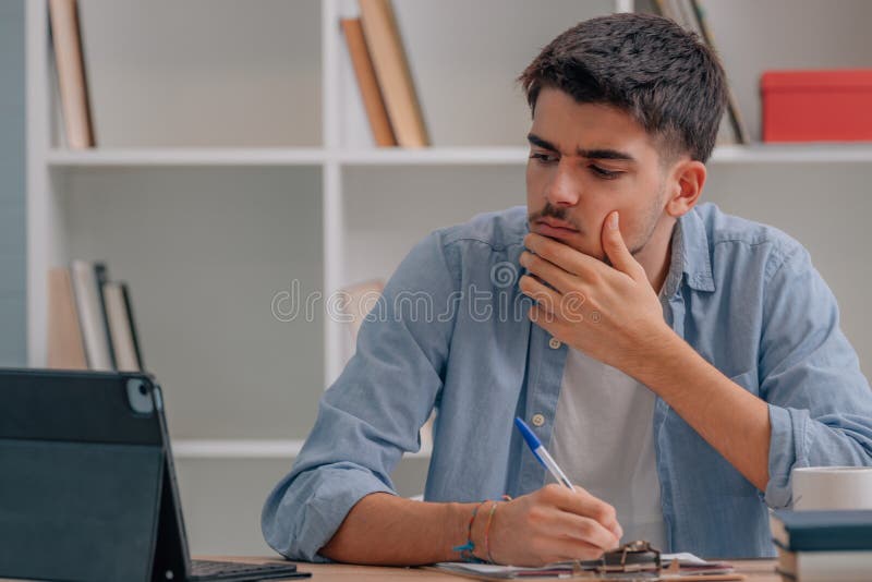 Student at Desk with Laptop Thinking with Doubt or Deciding Stock Image ...