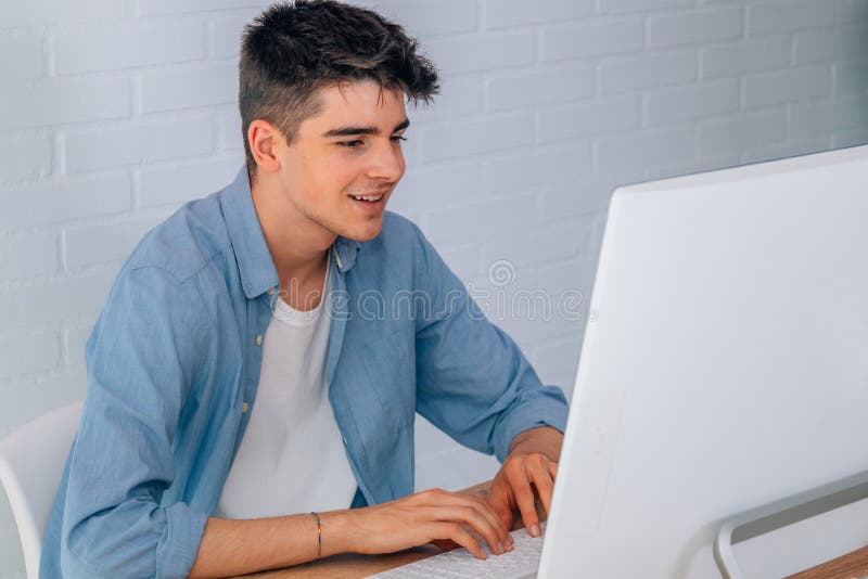 Student at Desk Working at Computer Stock Photo - Image of internet ...