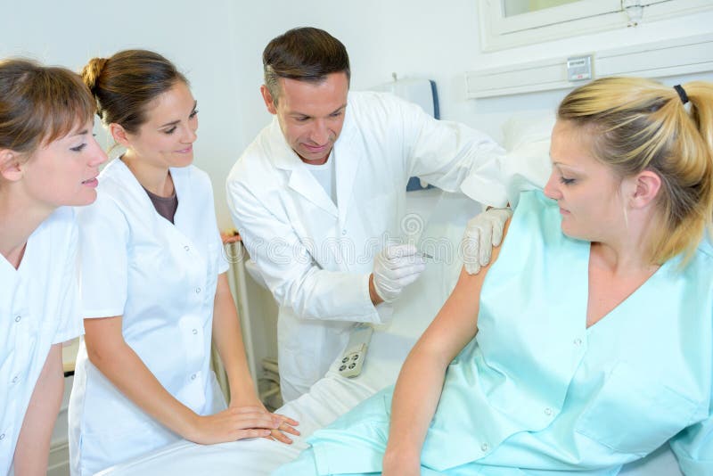 Student Doctor Performing Injection Stock Photo - Image of consultation ...