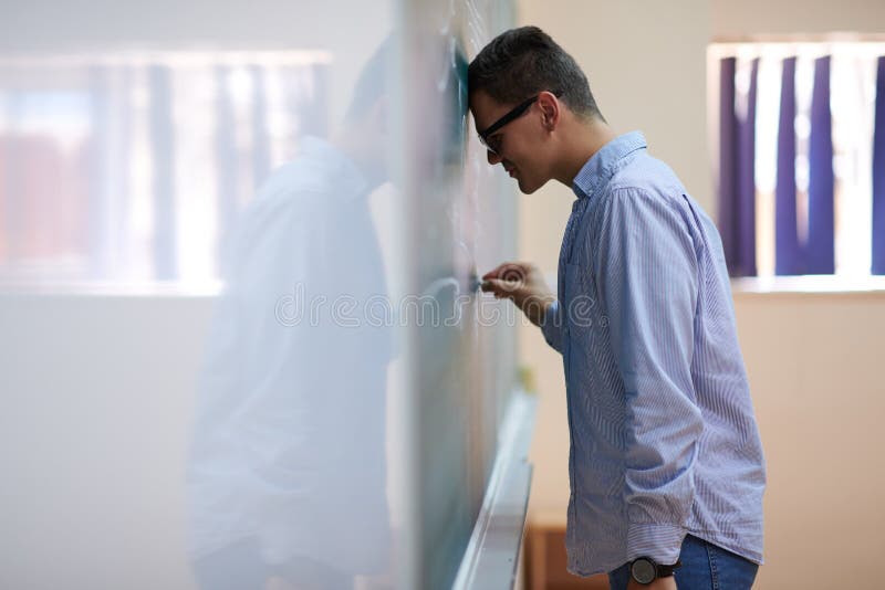 The Student Does the Task on the Board Stock Photo - Image of teacher ...