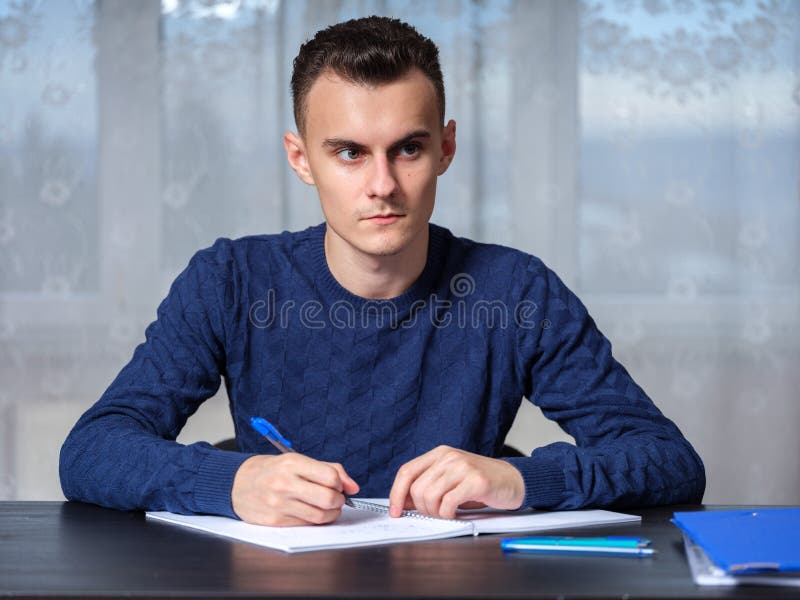 Student doing homework stock photo. Image of college - 107274496