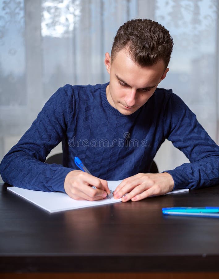 Student doing homework stock image. Image of exam, education - 107274549