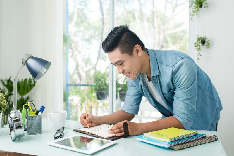 Student Doing Homework and Preparing Exam at Home. Stock Photo - Image ...