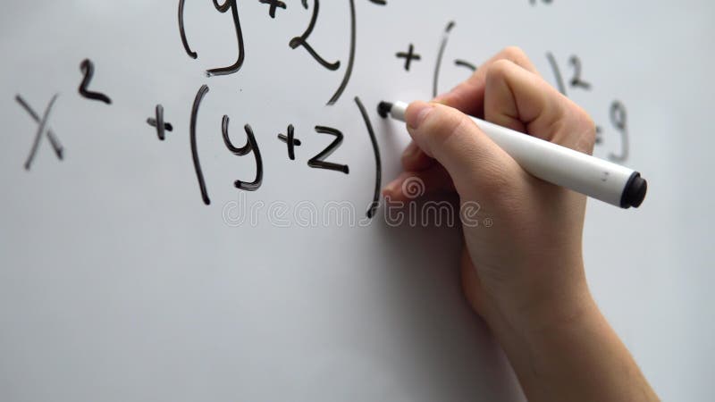 Student Doing Mathematic Exercises on Whiteboard, Writing Math Equation ...
