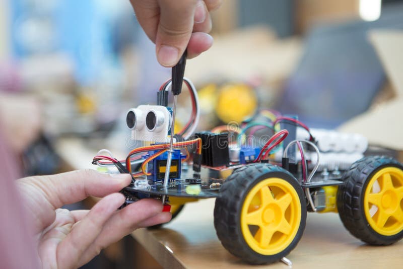 Student Doing Robot with Screwdriver in Robotics Coding Class Stock ... Student Doing Robot with Screwdriver in Robotics Coding Class Stock ...