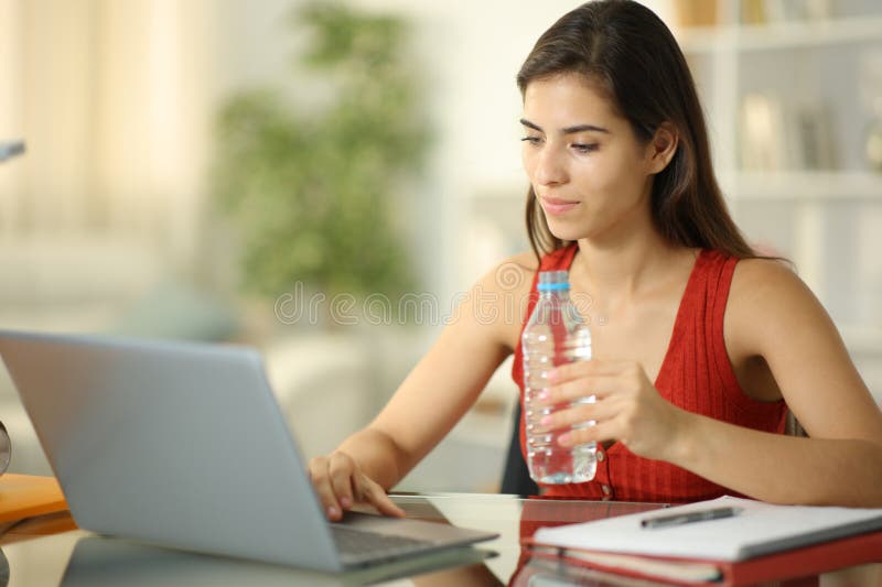 Student Drinking Water from Bottle at Home Stock Image - Image of ...