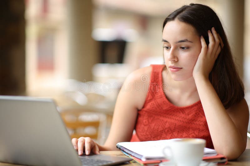 Student E-learning Using Computer in a Coffee Shop Stock Photo - Image ...