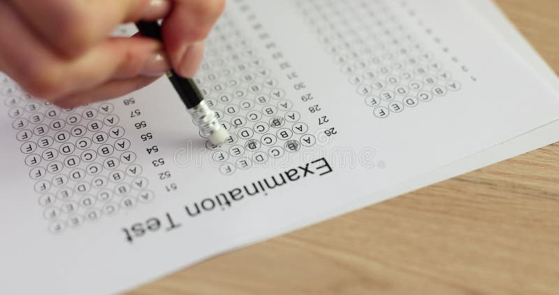 Student Erases Answer on Exam Form with Eraser on Pencil Stock Footage ...