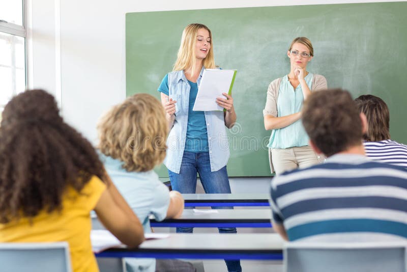 Explaining Teacher Standing in a Lecture Hall Stock Image - Image of ...